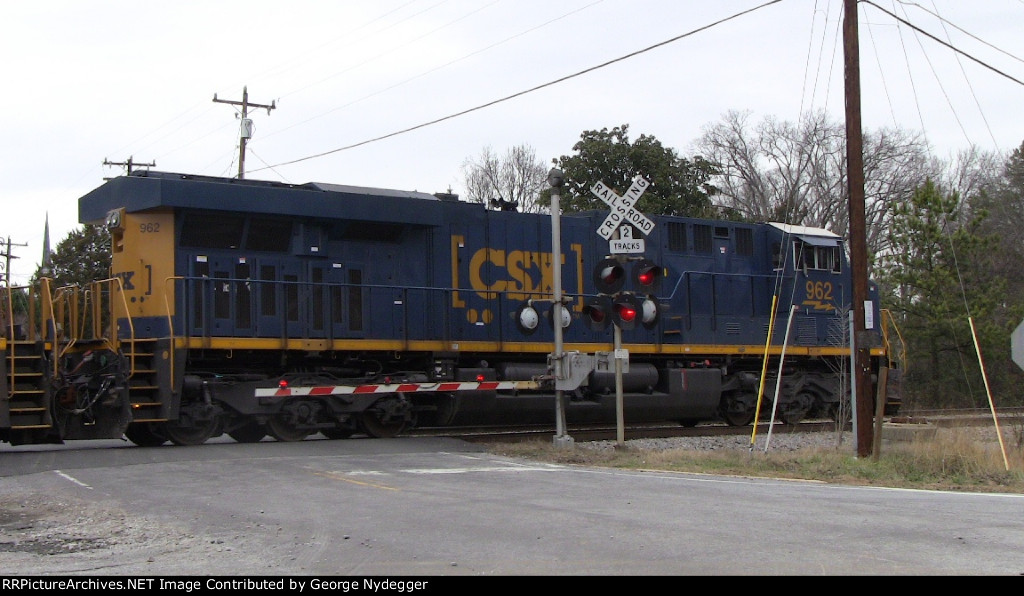 CSX 962 ES44AH at a crossing
